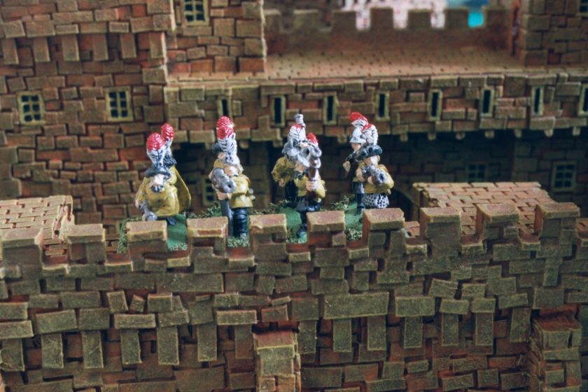 Empire Soldiers behind fortfications defending a Forgeworld castle ...